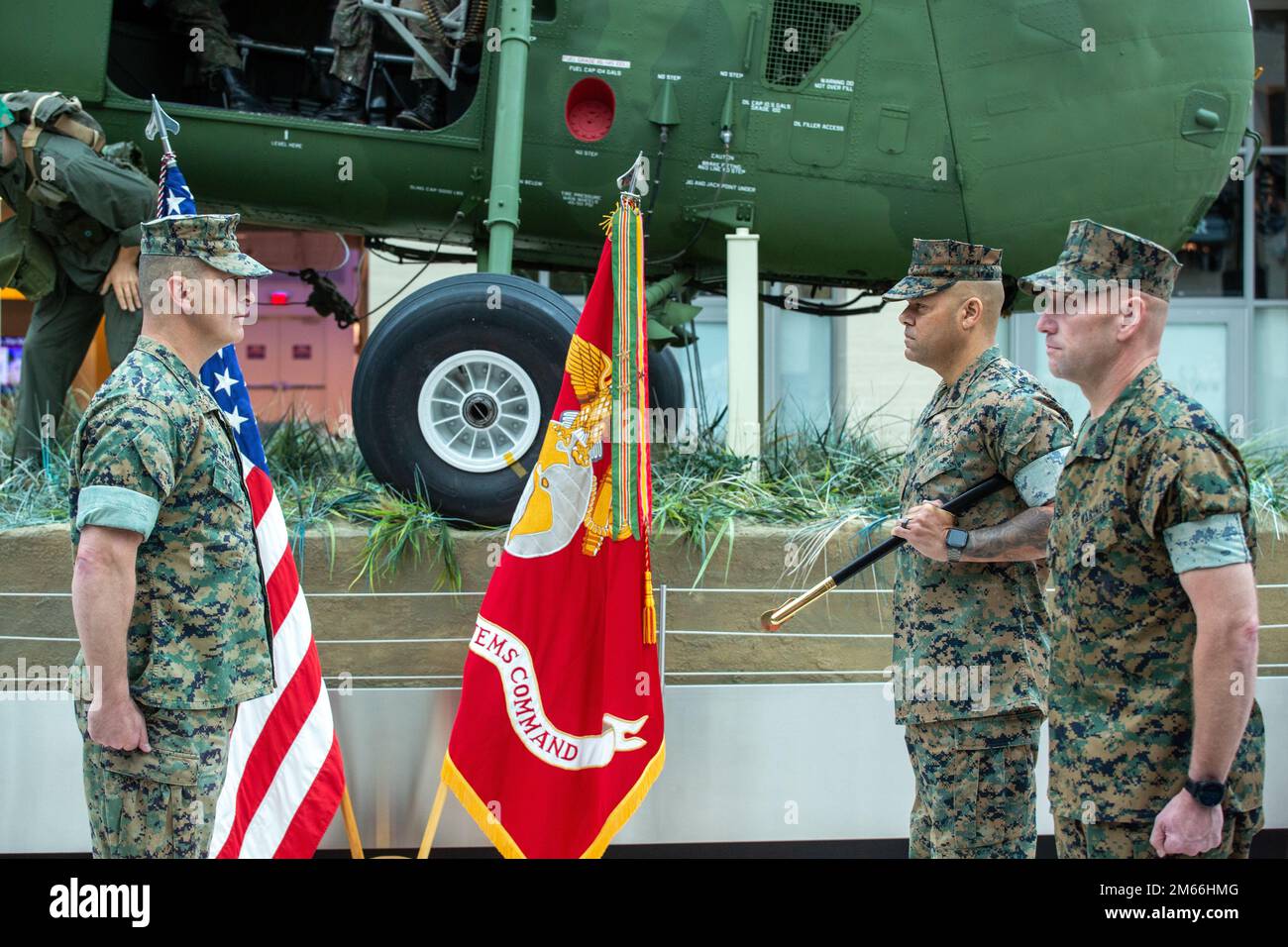 Sgt. Maj. Michael A. Cato, outgoing Marine Corps Systems Command Sergeant Major, holds the ...
