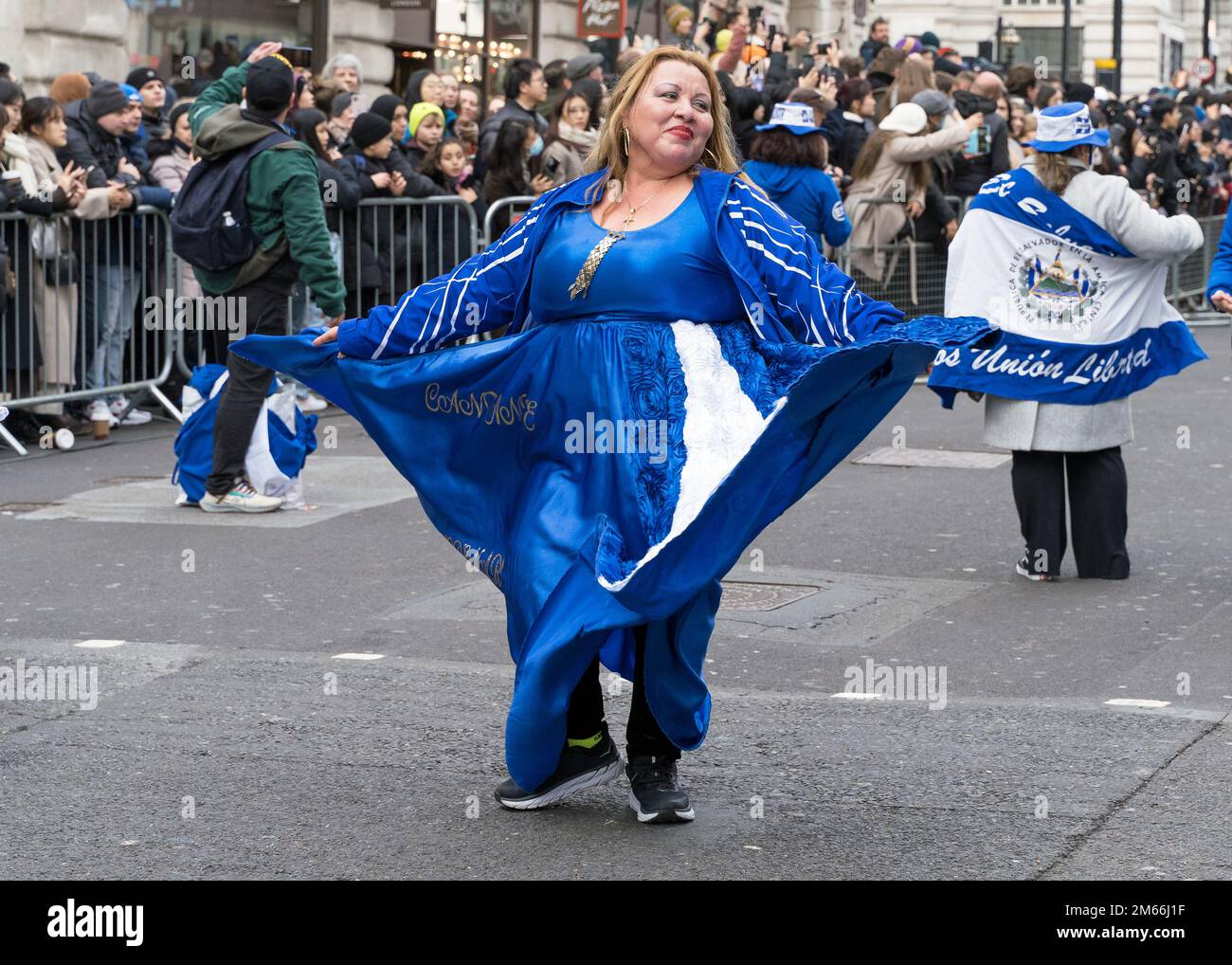 London New Years Day Parade, female in a carnival costume having fun ...