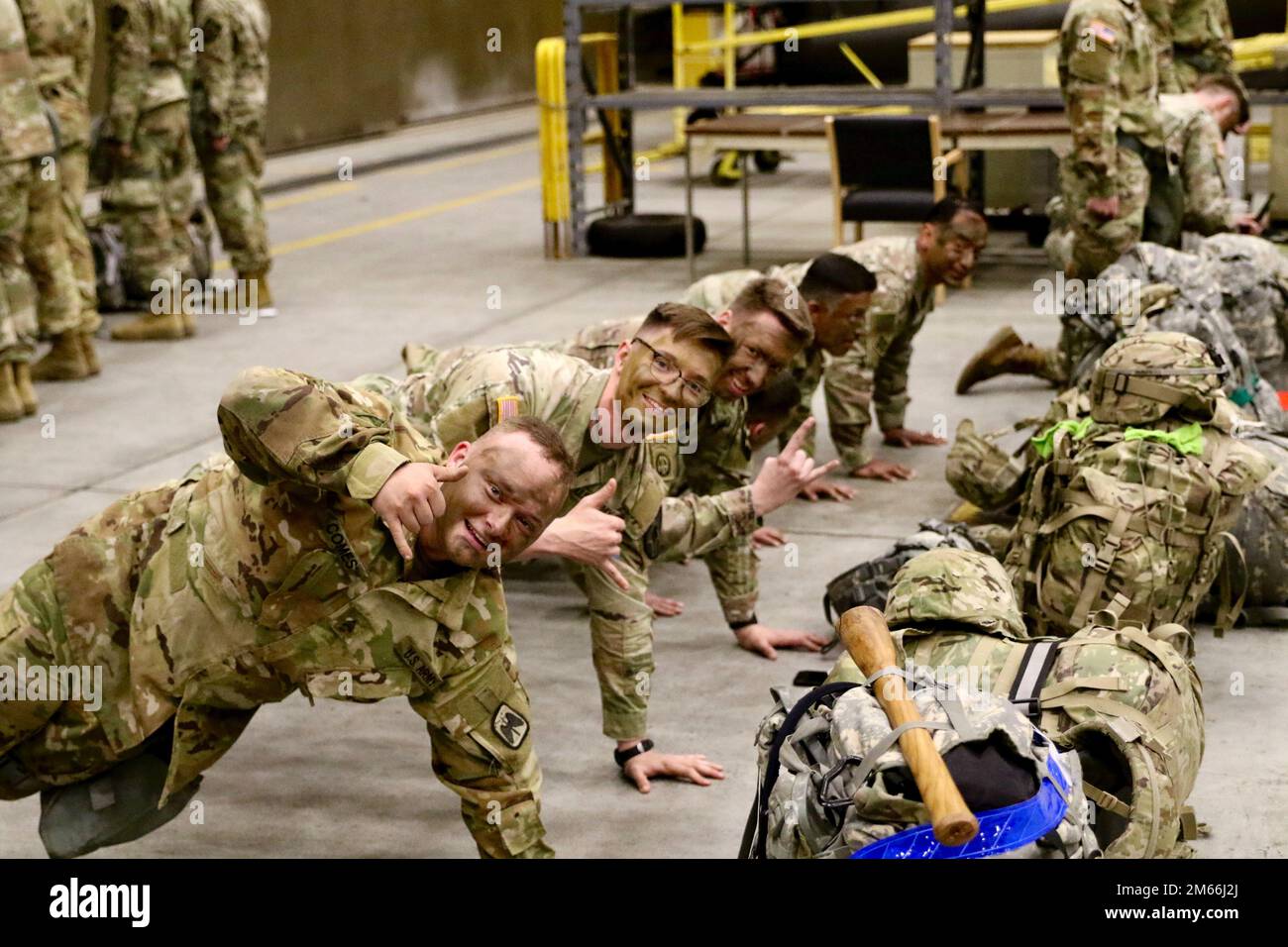 2nd Combat Aviation Brigade Soldiers pose after completing pushups ...
