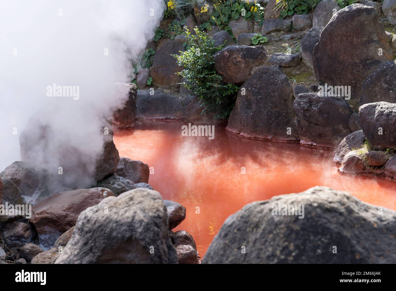 Red thermal pool Jigoku at Umijigoku in Beppu, Japan Stock Photo - Alamy