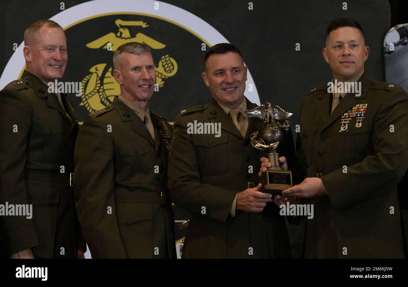 United States Marine Corps Lt. Col. James Garza accepts an award at the ...