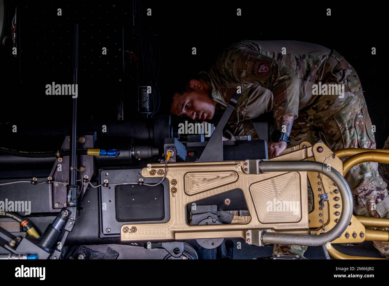A U.S. Airmen with the 1st Special Operations Wing prepares the 105 mm ...