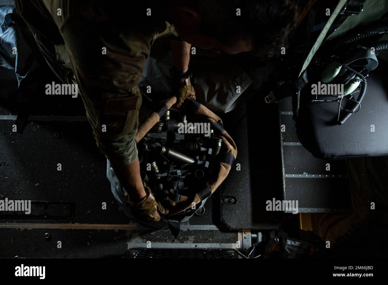 A U.S. Airmen with the 1st Special Operations Wing clears the shells of ...