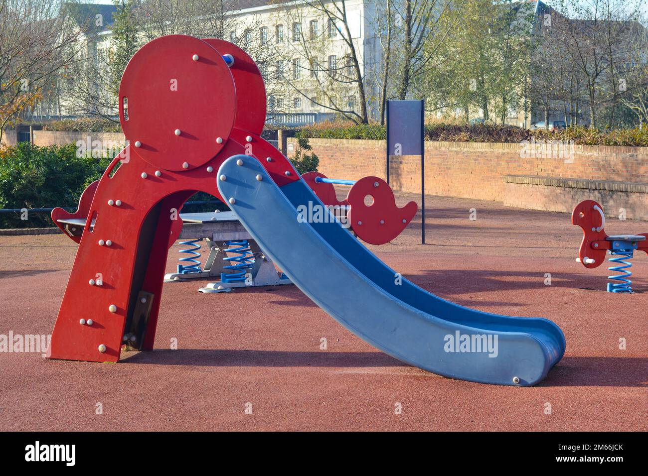 Children playground blue-red slider for kids Stock Photo - Alamy