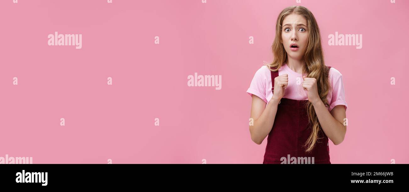 Young silly coward girl feeling insecure and scared stand up for ...