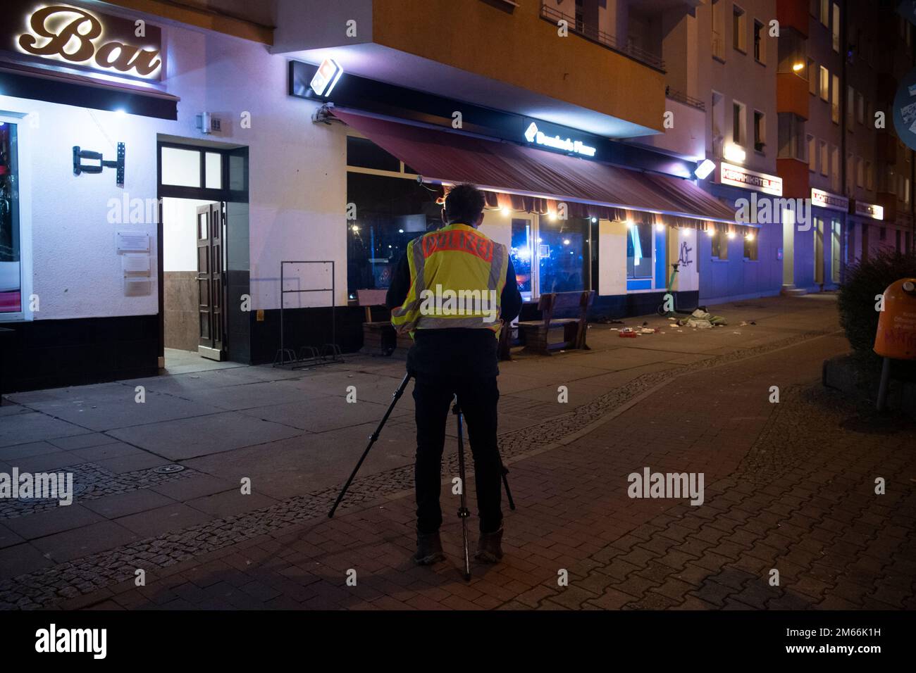 Berlin, Germany. 02nd Jan, 2023. A police officer photographs a ...