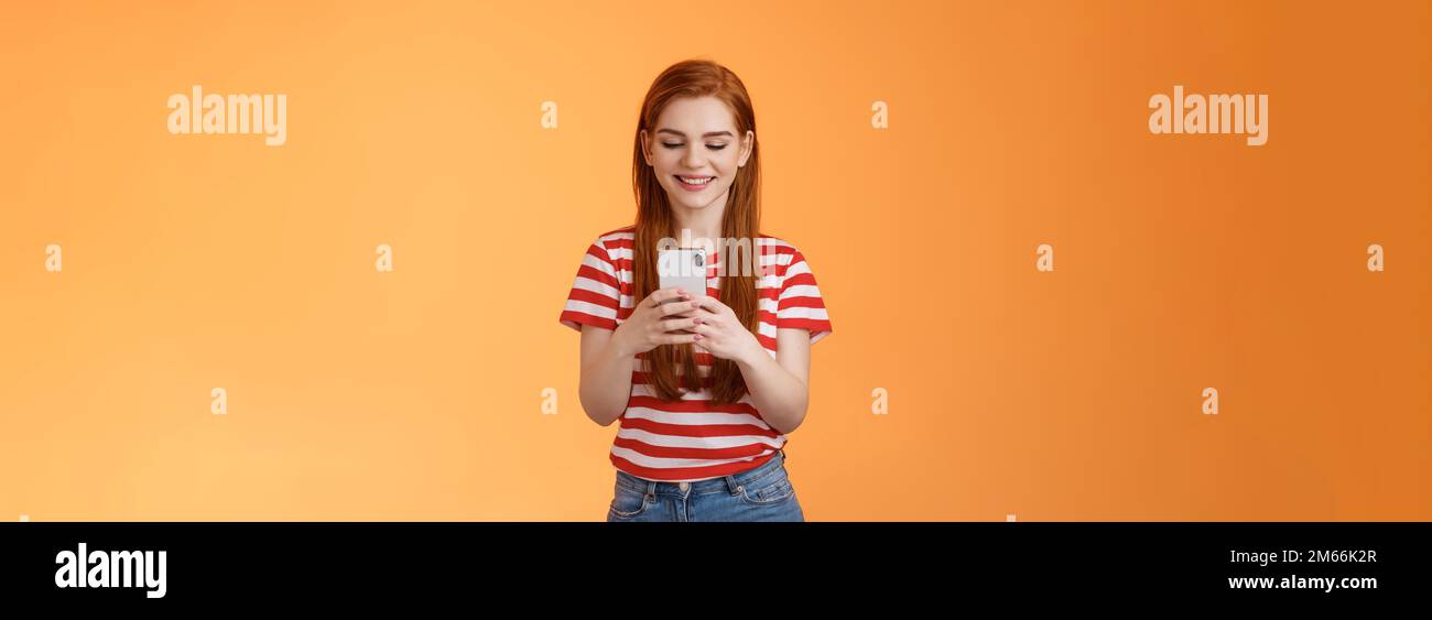 Friendly outgoing modern ginger girl communicating friends, chatting ...