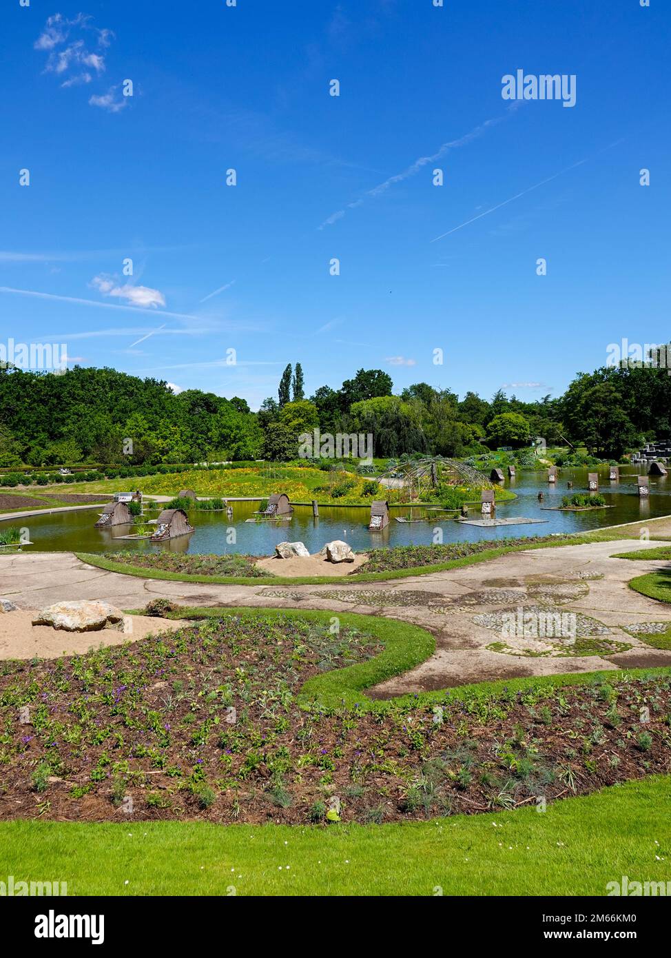Parc Floral, a public botanical garden in the spring with water feature ...