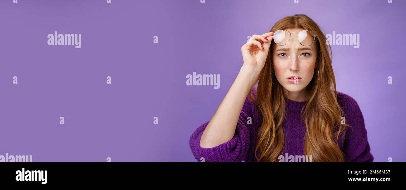 Waist-up shot of intense confused and unsure cute redhead female cannot ...
