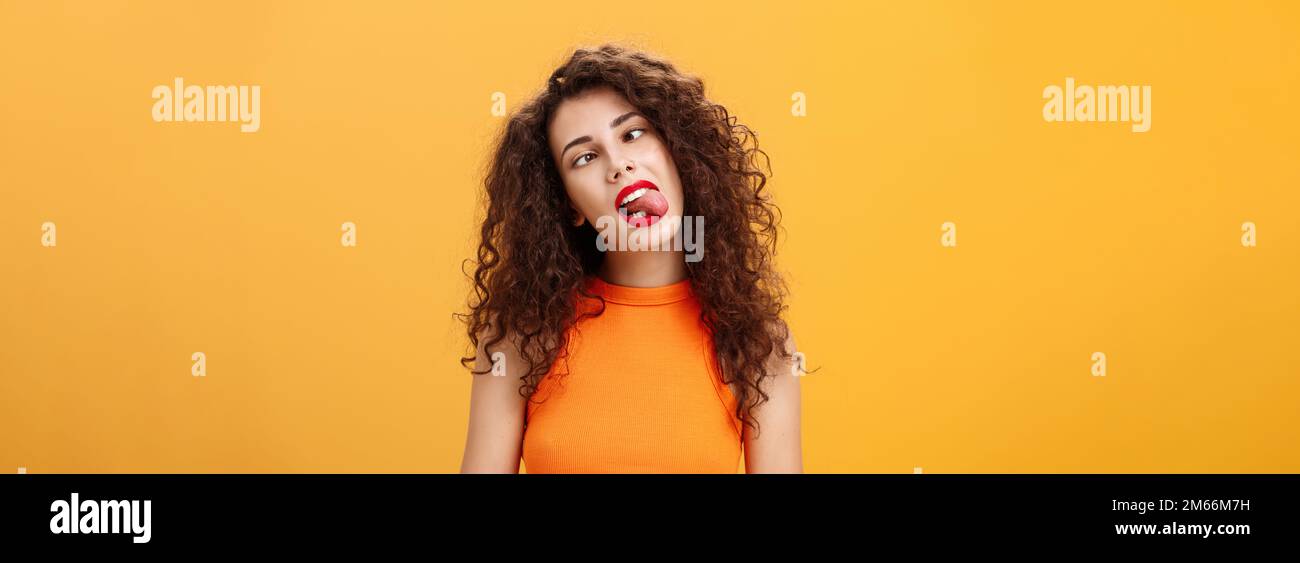 Girl fooling around carefree feeling bored trying amuse herself during ...