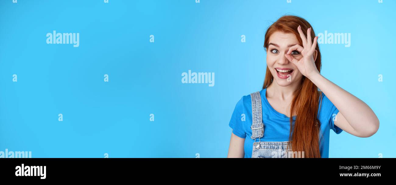 Cheerful upbeat redhead european female feel lucky inspired, look ...