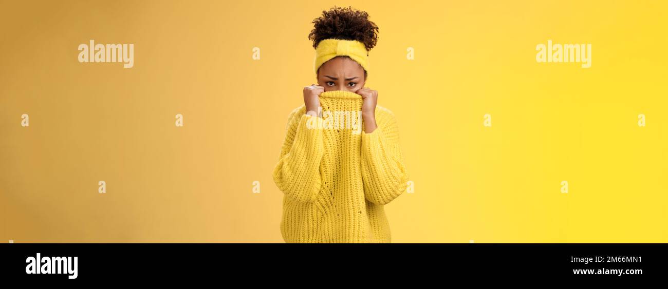 Cute upset scared timid insecure african-american offended girl hiding ...