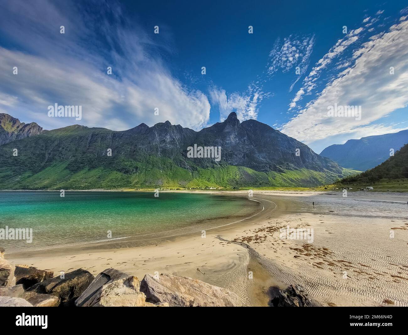 The crystal clear water of the Ersfjordstranda beach in Senja Island ...