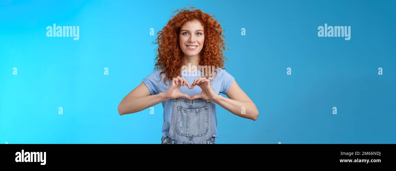 Tenderness, love, romance concept. Lovely feminine cute redhead curly ...