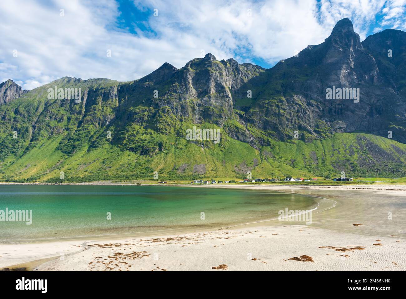 The crystal clear water of the Ersfjordstranda beach in Senja Island ...