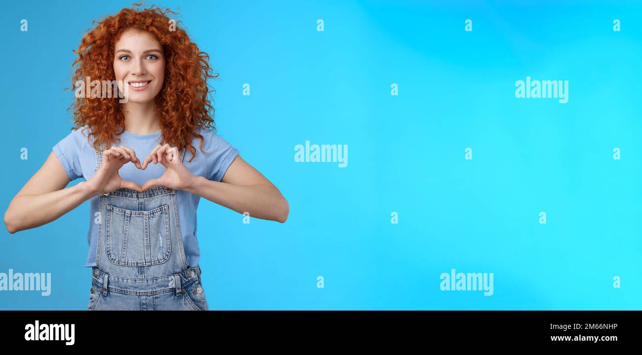 Tenderness, love, romance concept. Lovely feminine cute redhead curly ...