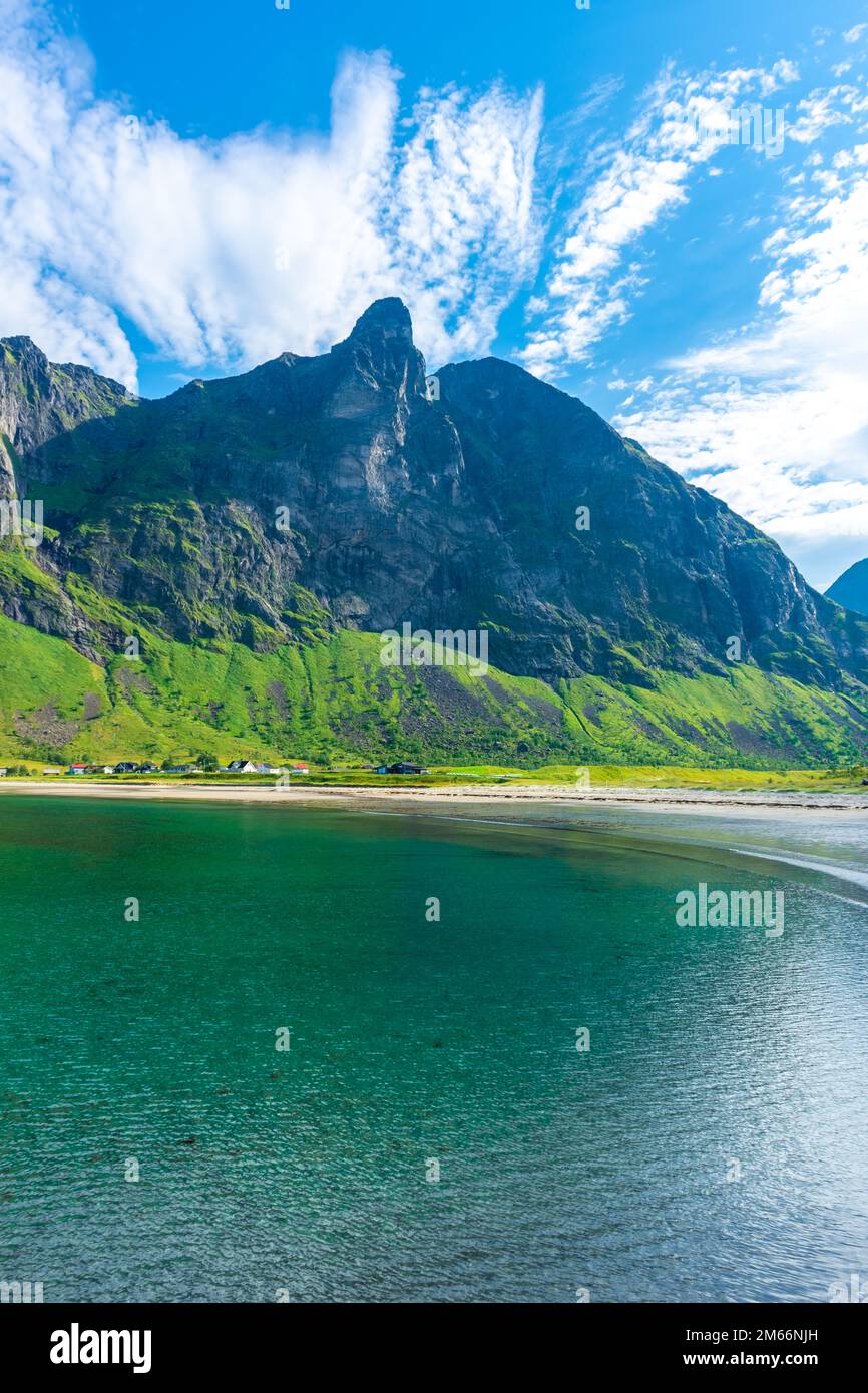 The crystal clear water of the Ersfjordstranda beach in Senja Island ...