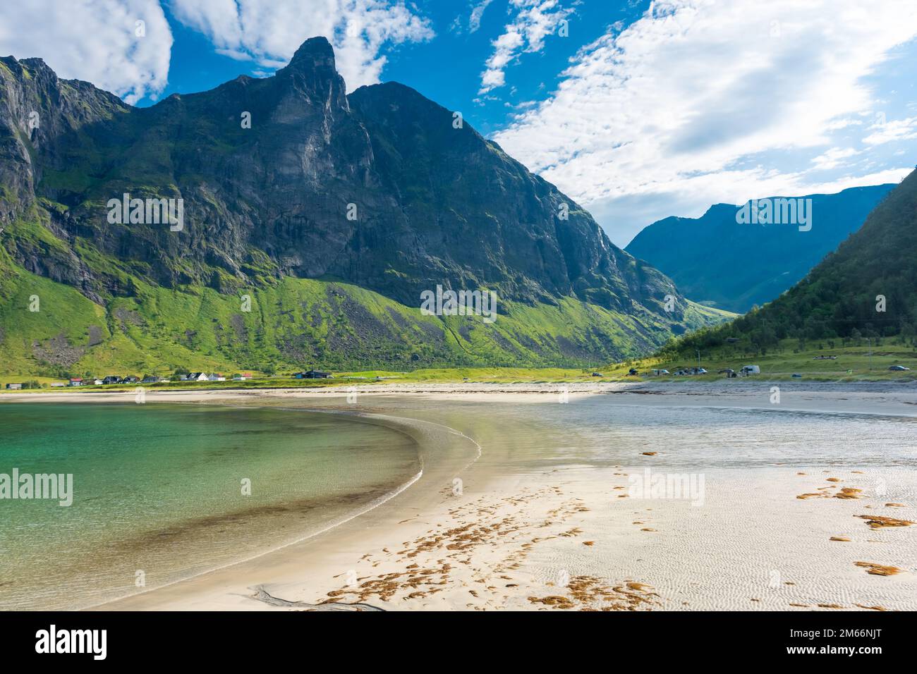 The crystal clear water of the Ersfjordstranda beach in Senja Island ...