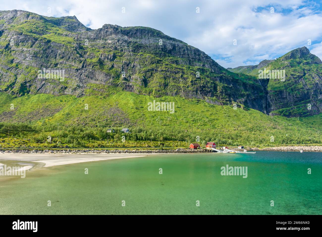 The crystal clear water of the Ersfjordstranda beach in Senja Island ...