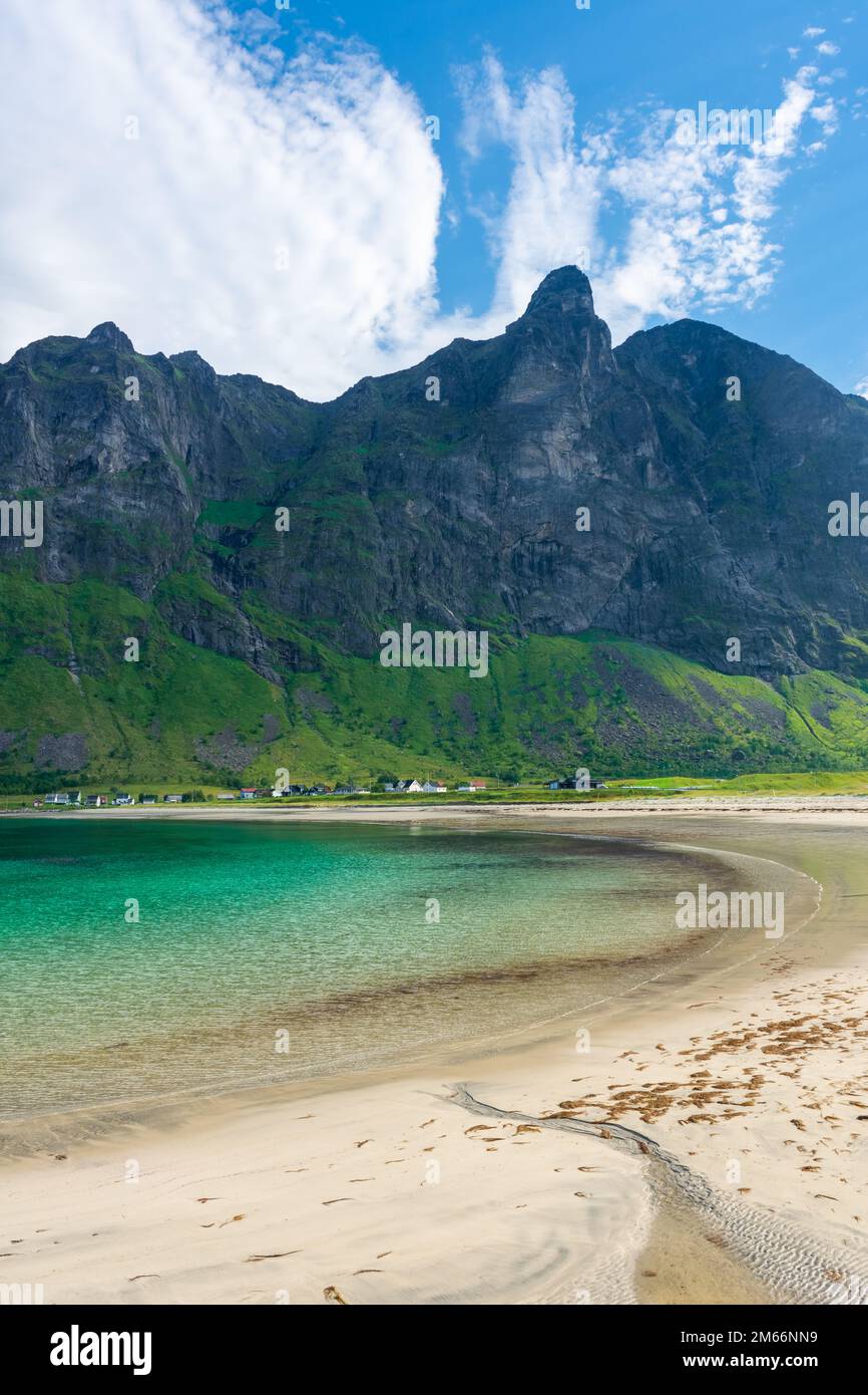 The crystal clear water of the Ersfjordstranda beach in Senja Island ...