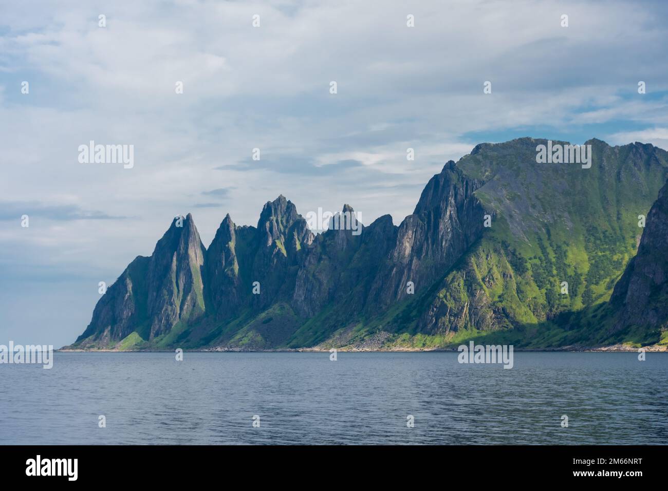The crystal clear water of the Ersfjordstranda beach in Senja Island ...