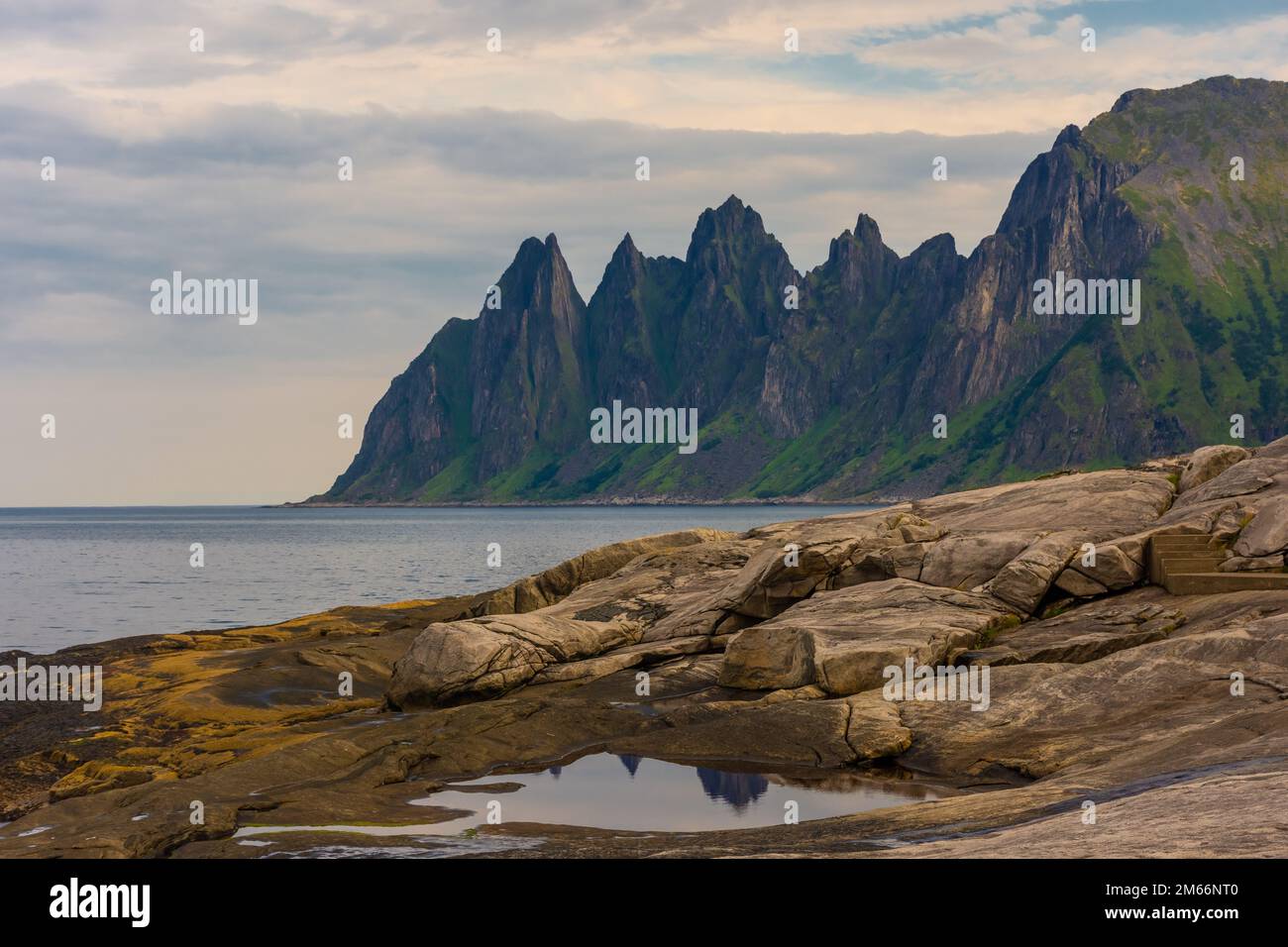 The Tungeneset (Devil's Teeth), mountains over the ocean in Senja ...