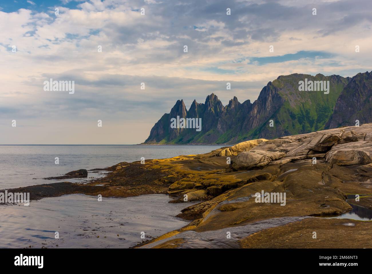 The Tungeneset (Devil's Teeth), mountains over the ocean in Senja ...