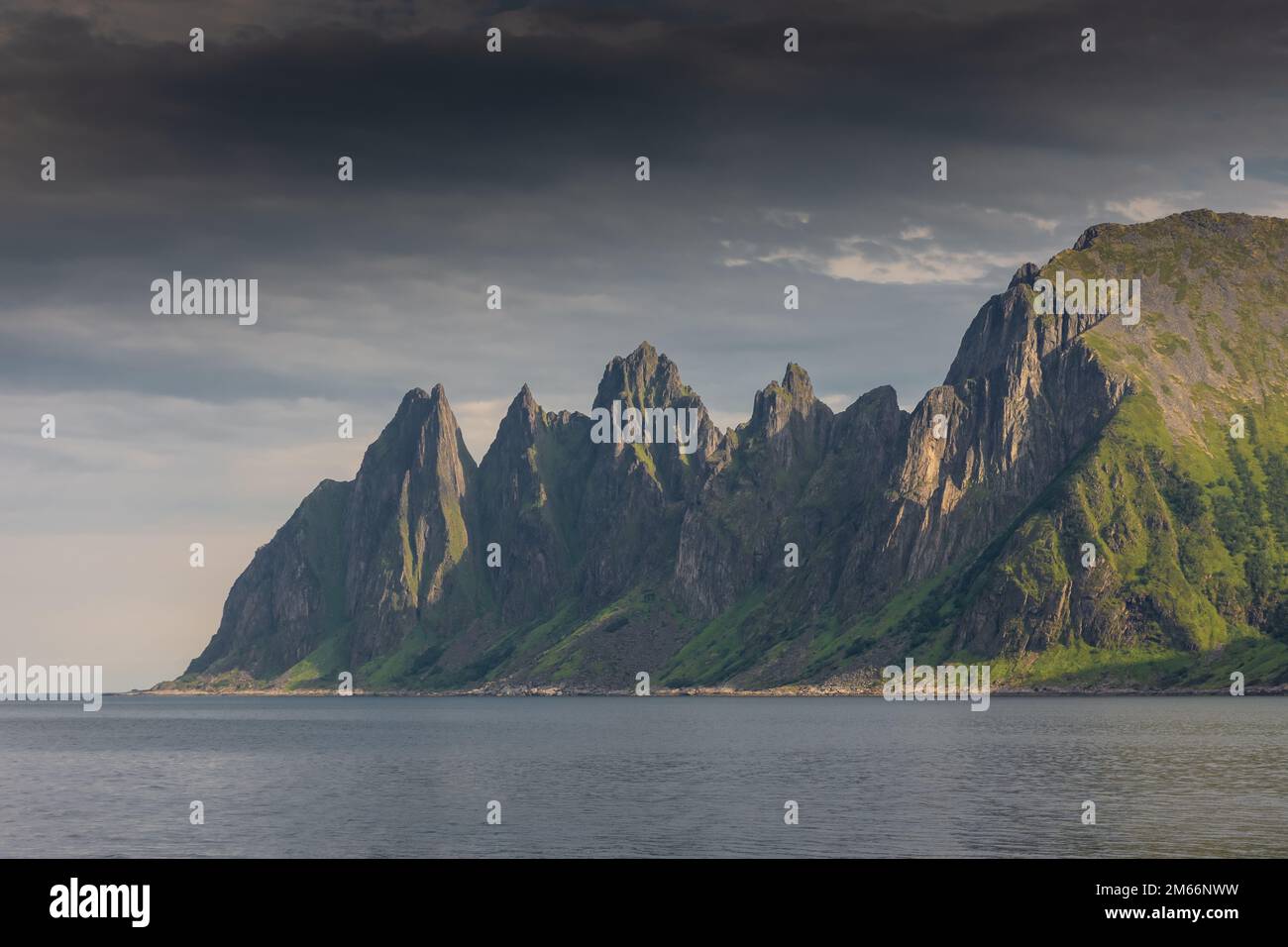 The Tungeneset (Devil's Teeth), mountains over the ocean in Senja ...