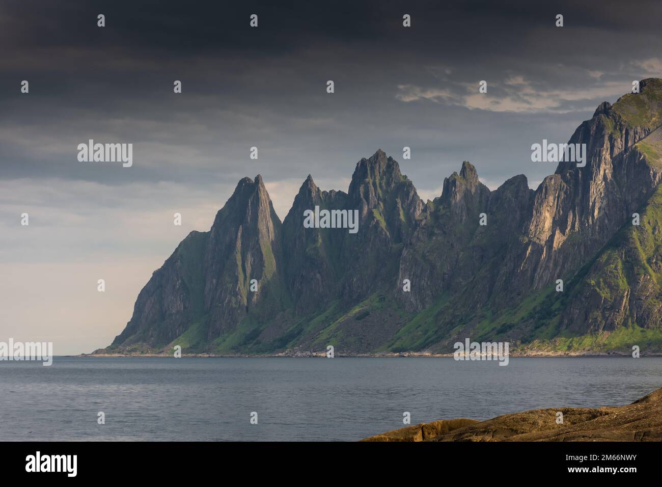 The Tungeneset (Devil's Teeth), mountains over the ocean in Senja ...