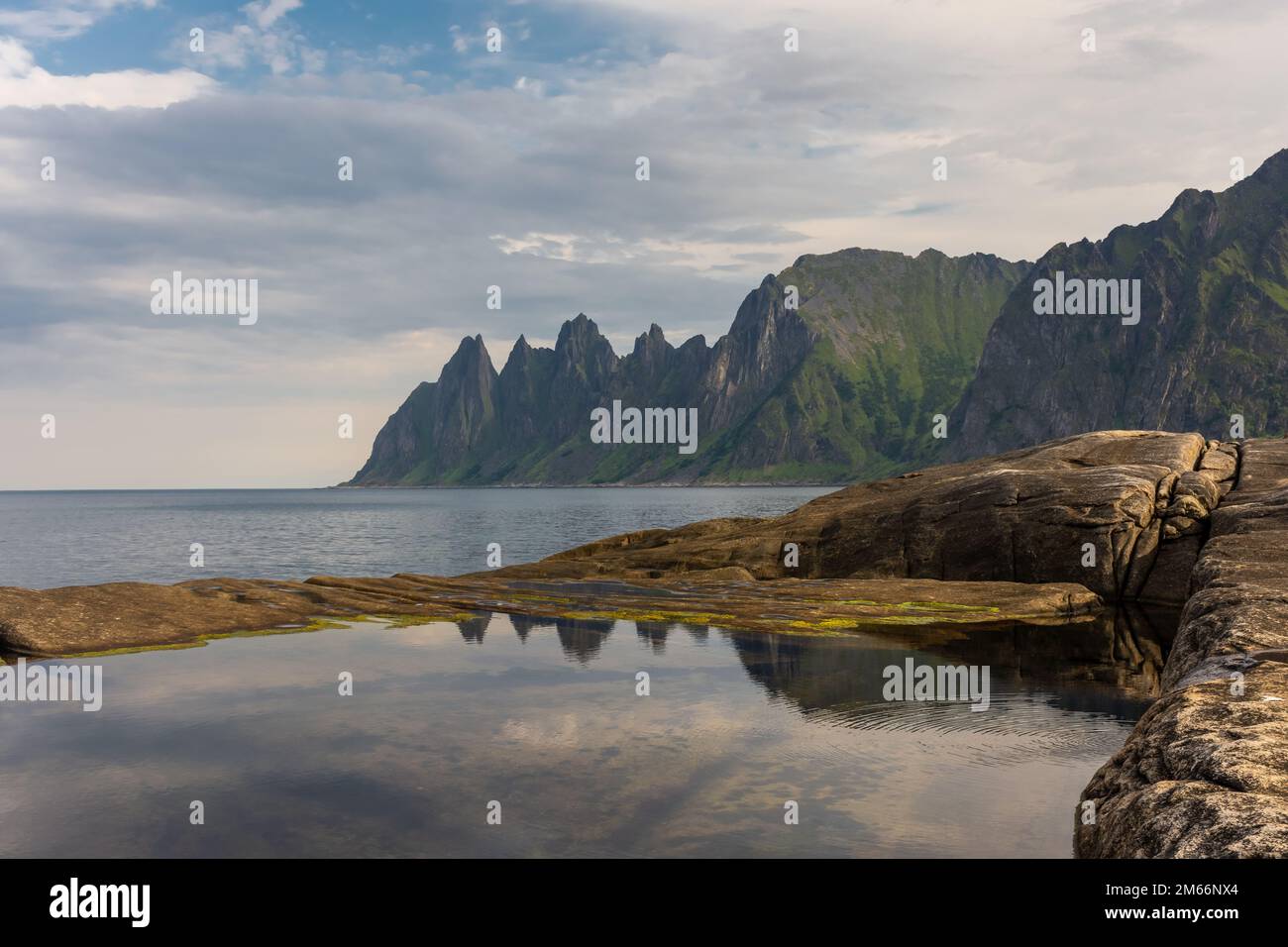 The Tungeneset (Devil's Teeth), mountains over the ocean in Senja ...