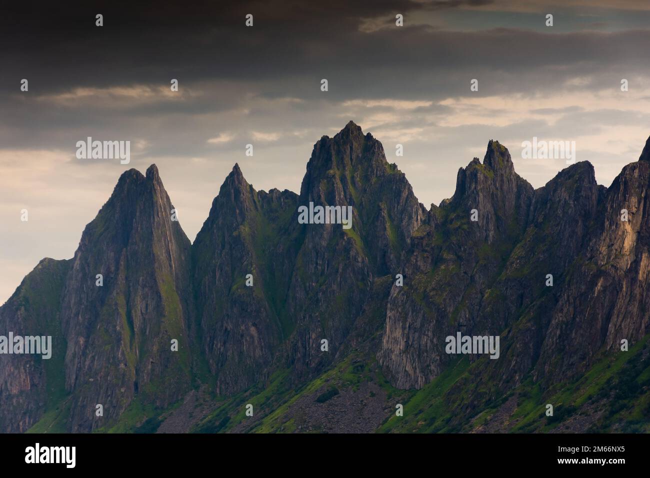 The Tungeneset (Devil's Teeth), mountains over the ocean in Senja ...