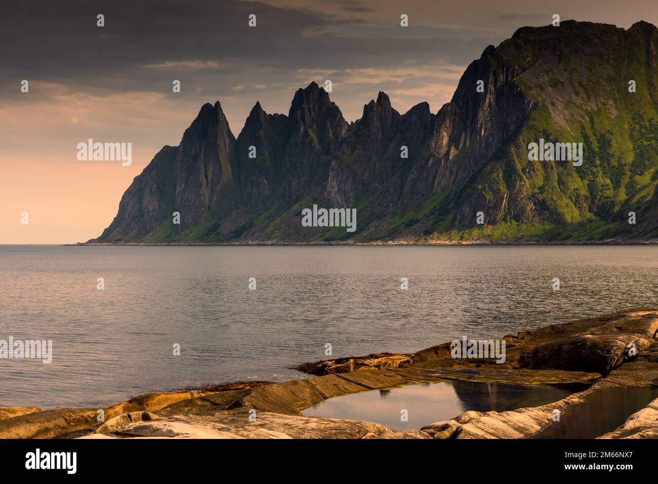 The Tungeneset (Devil's Teeth), mountains over the ocean in Senja ...