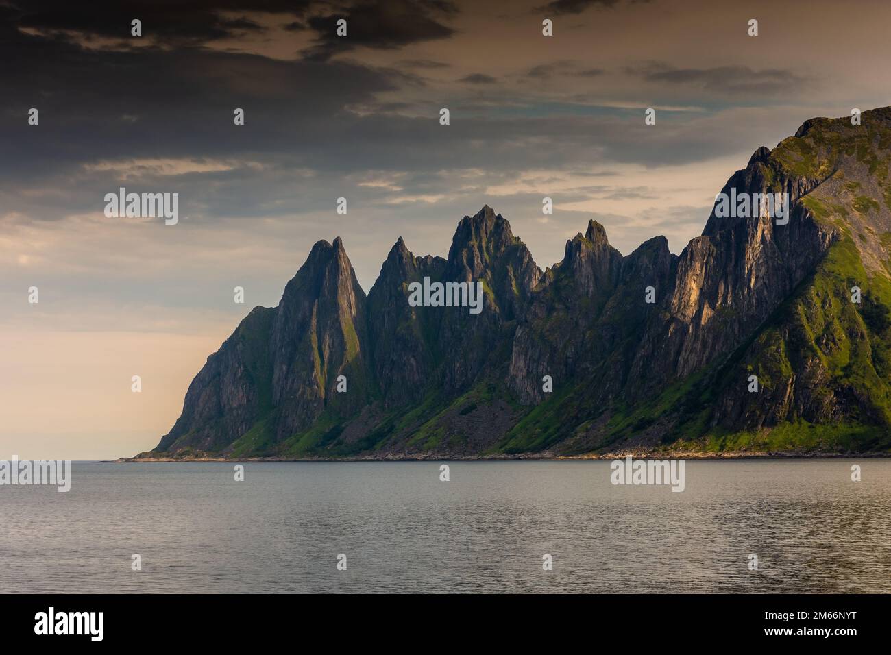 The Tungeneset (Devil's Teeth), mountains over the ocean in Senja ...