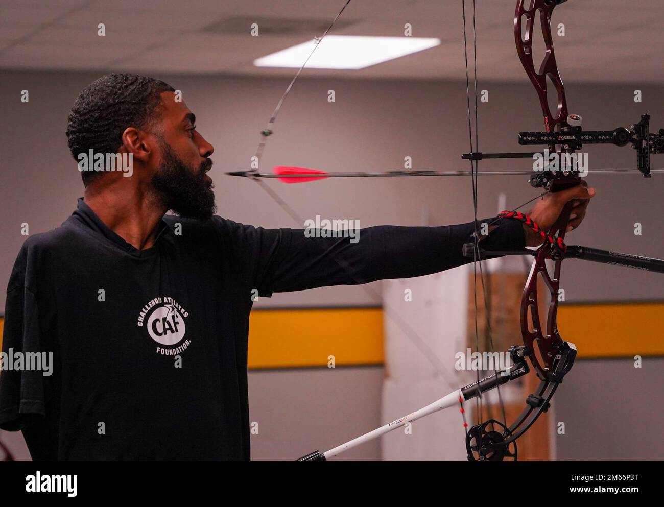 Retired U.S. Navy HN Gabriel George, Team U.S., prepares to fire his ...