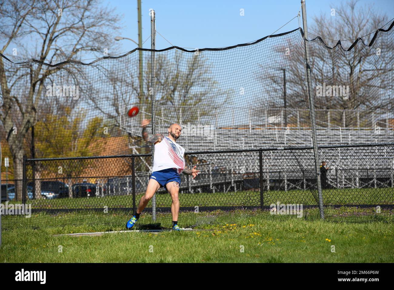 Retired U.S. Air Force SrA Rafael Morfinencisco, throws discus during ...