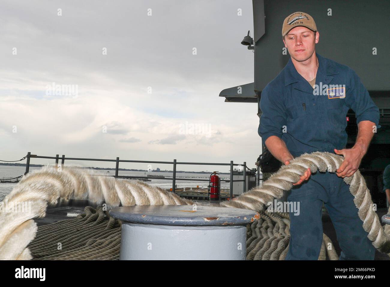 Boatswain's Mate Seaman Tarin Adams, from Newberg, Oregon, assigned to ...
