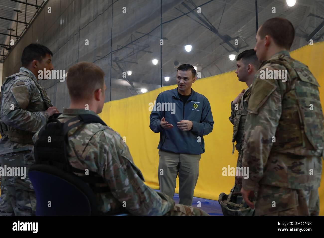 Staff Sgt. Jacob Grove, the head coach of the 4th Infantry Division ...