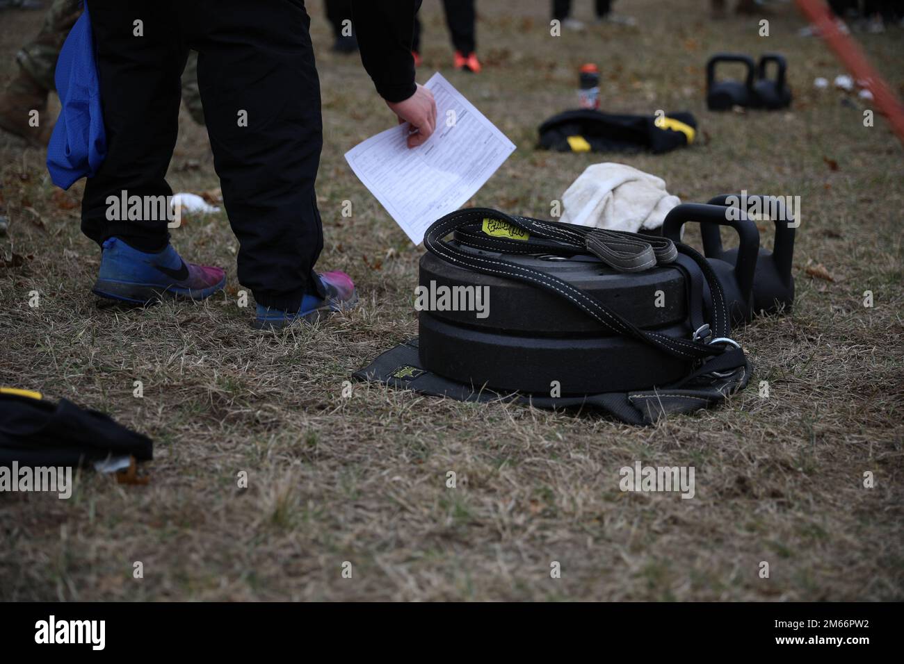 A Soldier picks up his Army Combat Fitness Test score sheet during the ...