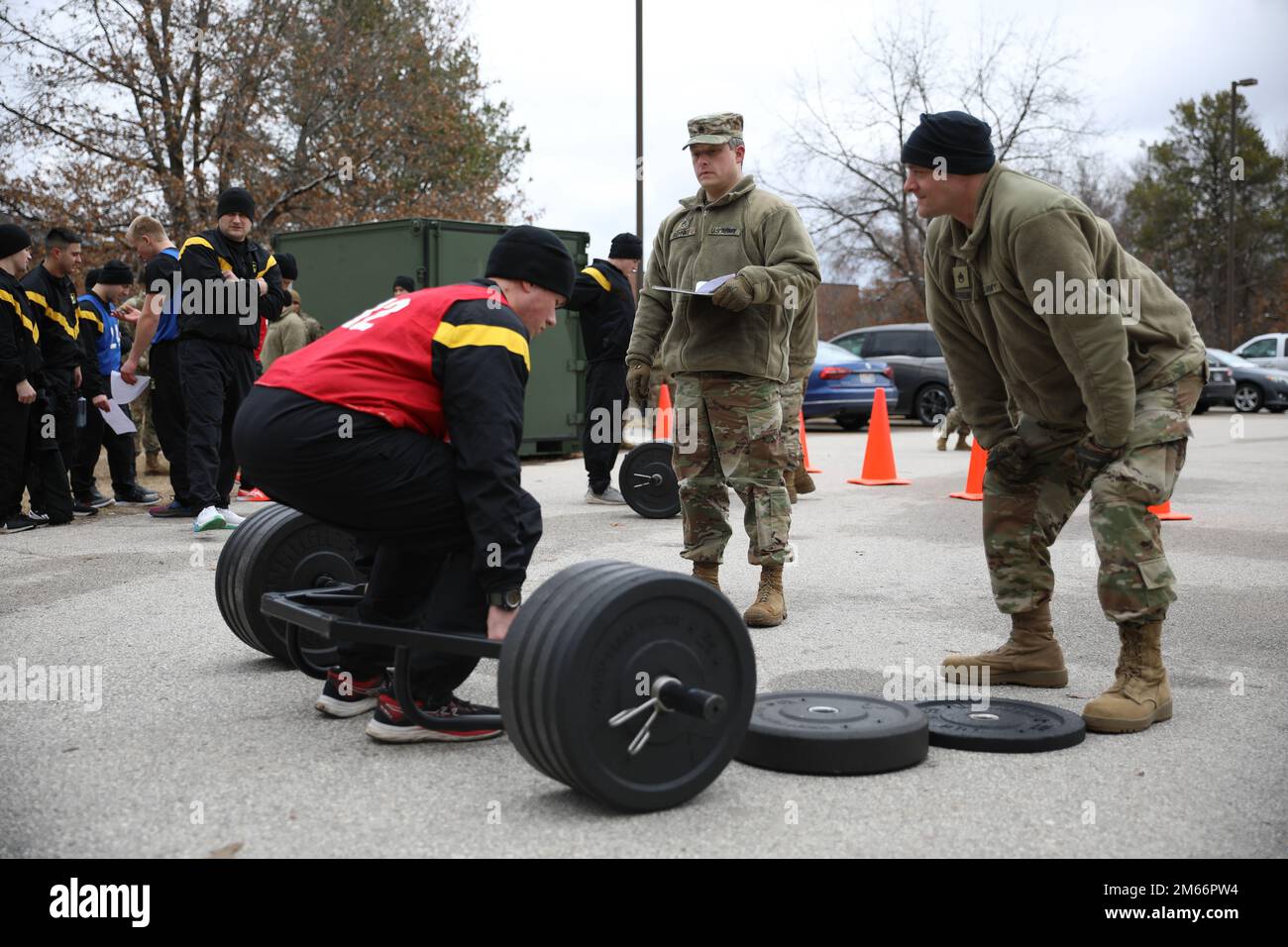A Soldier completes a dead lift during the Army Combat Fitness Test at ...