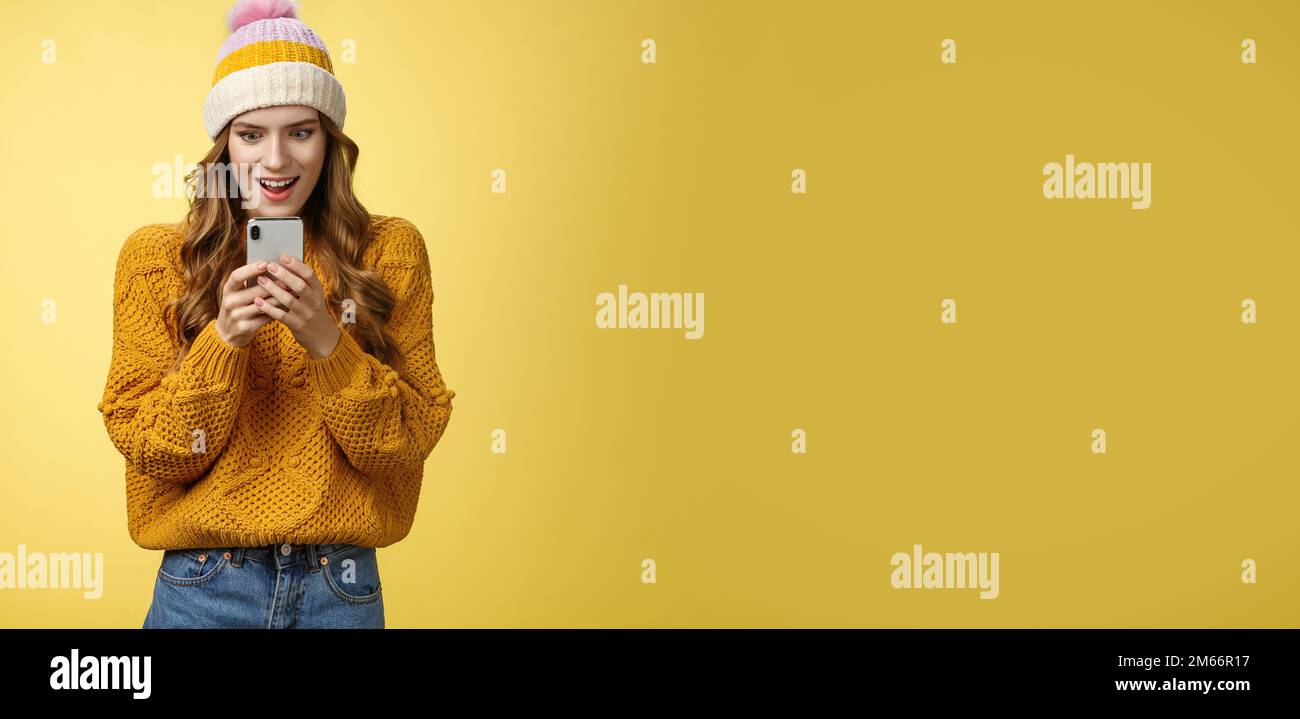 Amazed attractive stylish woman receive message smartphone awesome ...