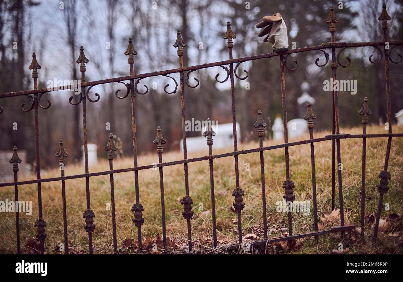 A glove on a cemetery fence, North Turner, Maine Stock Photo - Alamy
