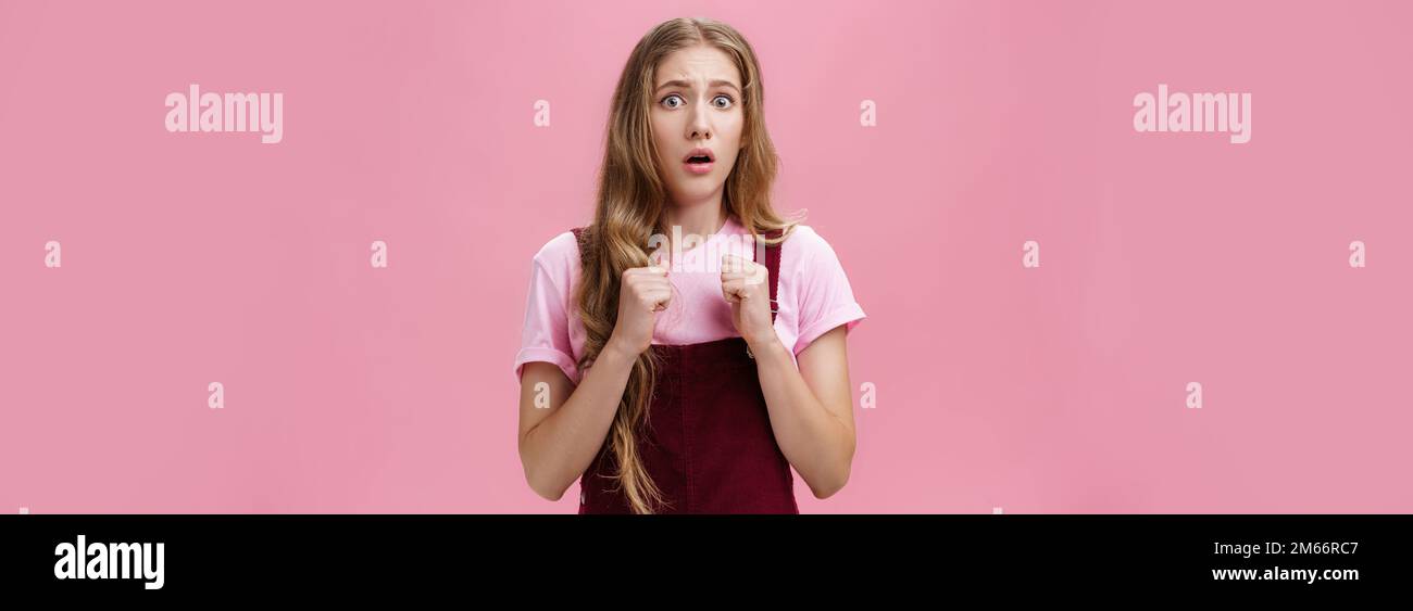 Young silly coward girl feeling insecure and scared stand up for ...