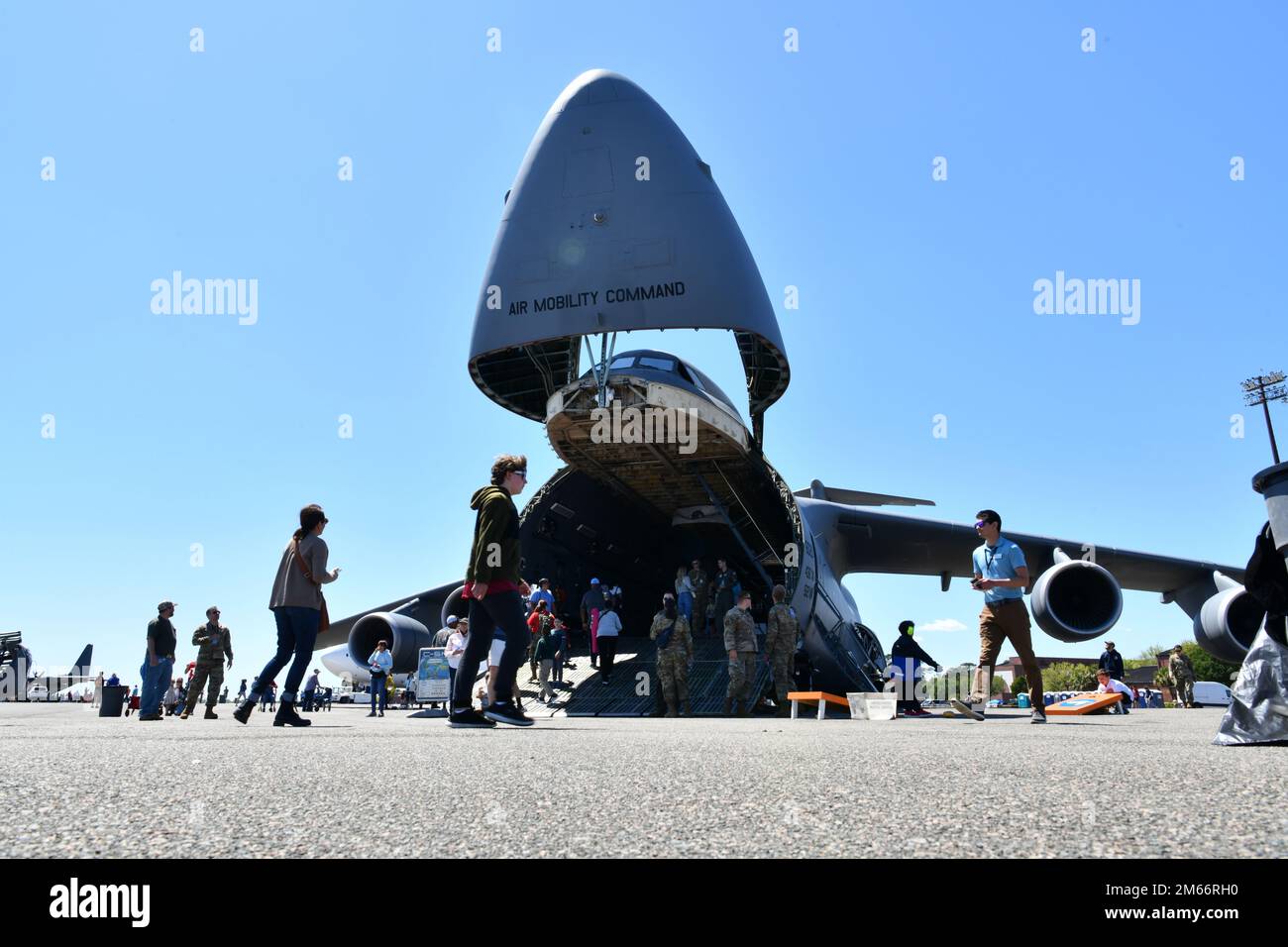 Attendees tour a C-5M Super Galaxy static display at the Titans of ...