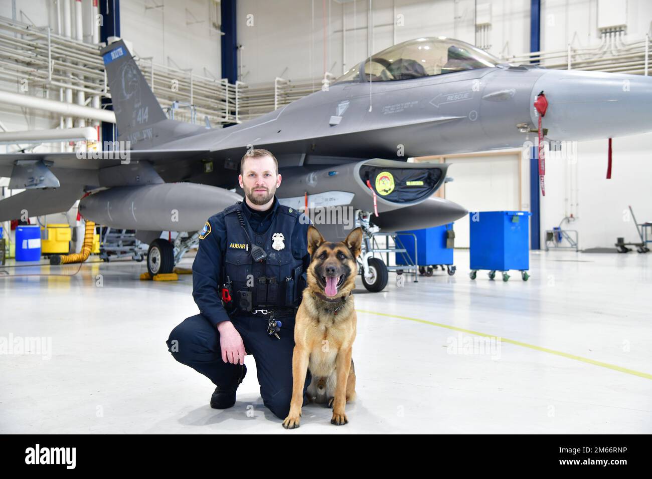 Officer Josh Aubart and K9 Vili of the Duluth Police Department tour the 148th Fighter Wing as ...