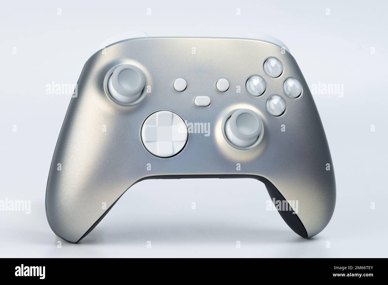 Wireless silver color game joystick isolated on white studio background ...