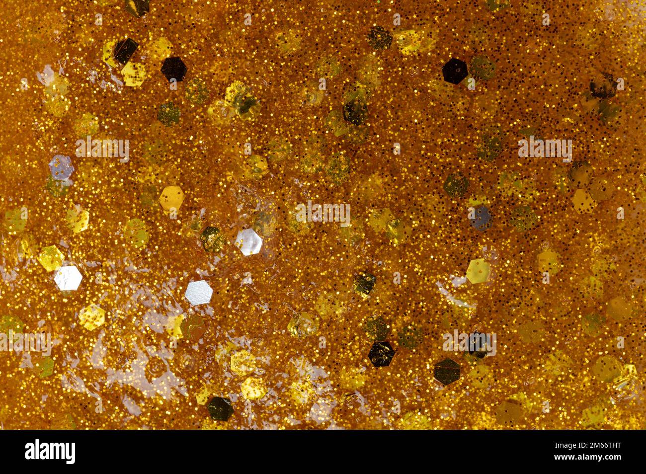 Gold color slime gltter texture background close up view Stock Photo ...
