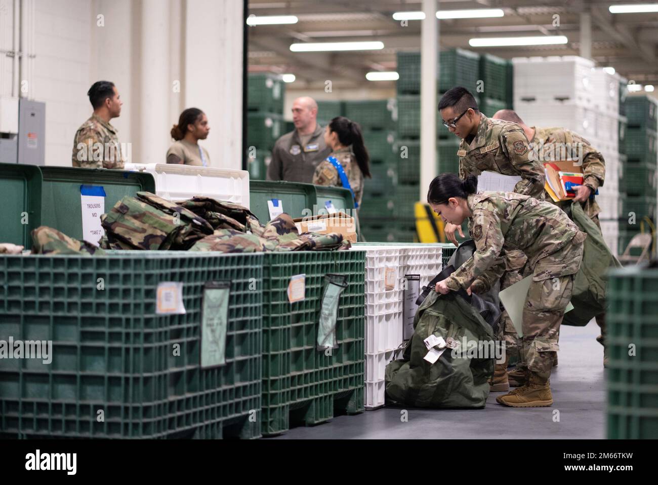 U.S. Airmen assigned to the 60th Air Mobility Wing collect chemical ...