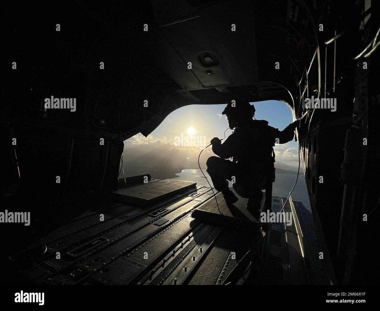 A 25th Infantry Division CH-47 Chinook helicopter repairer enjoys a ...