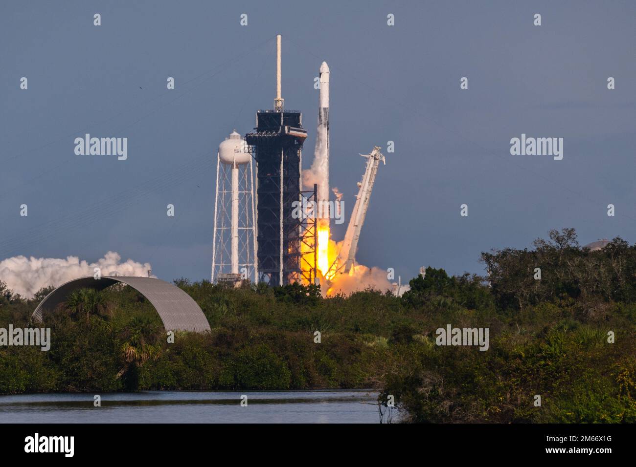 A Falcon 9 rocket carrying the Commercial Resupply Mission launches ...