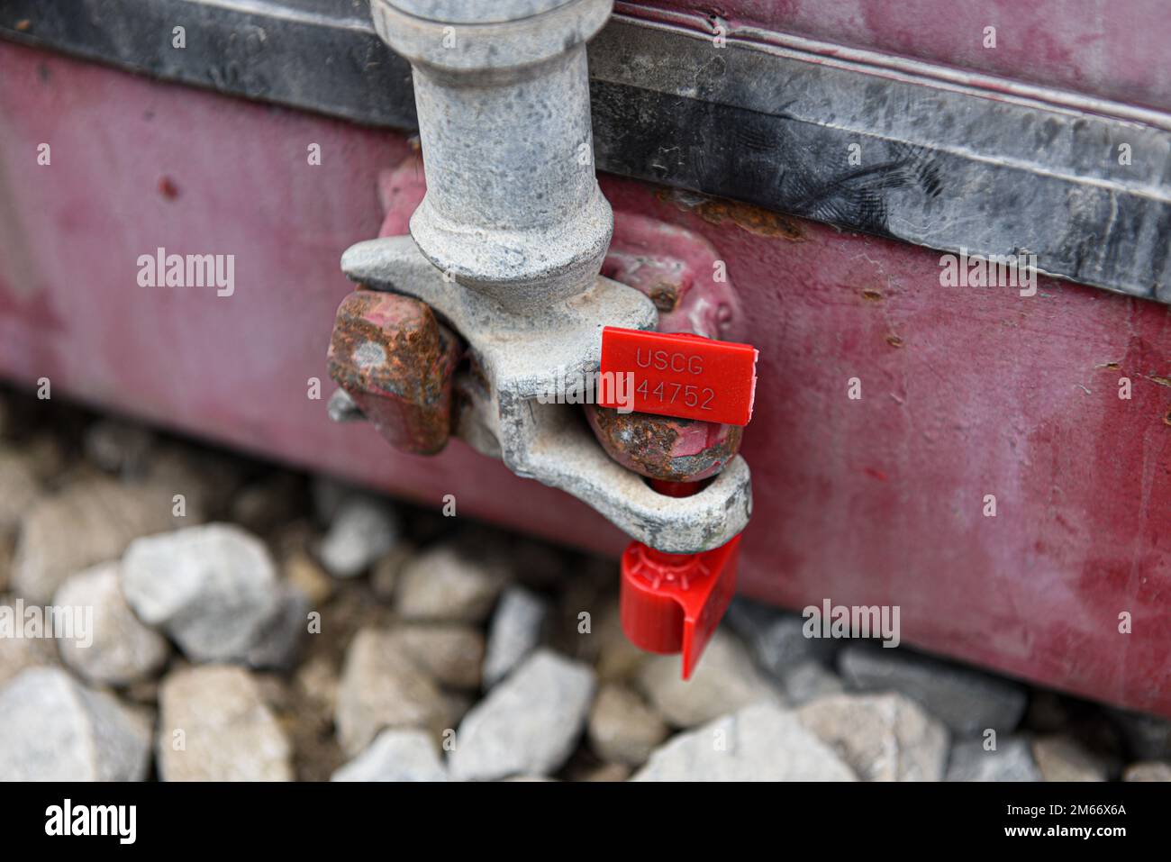 A Coast Guard high security seal secures a shipping container after ...